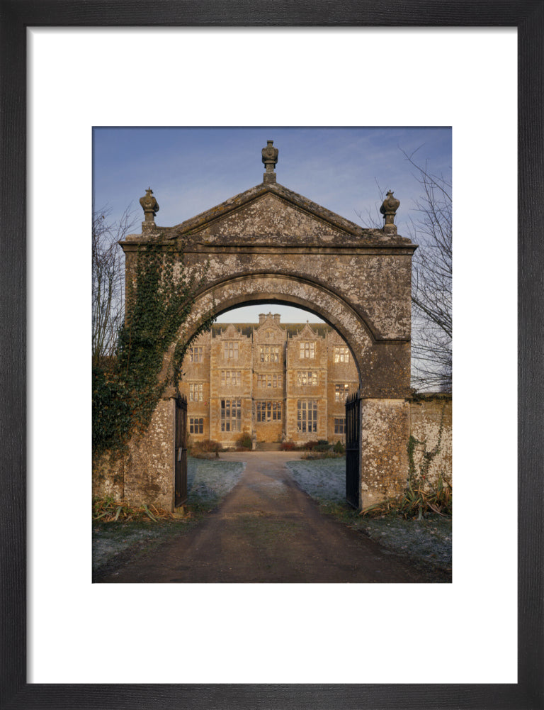 View of the south front of Chastleton seen through the entrance gates ...