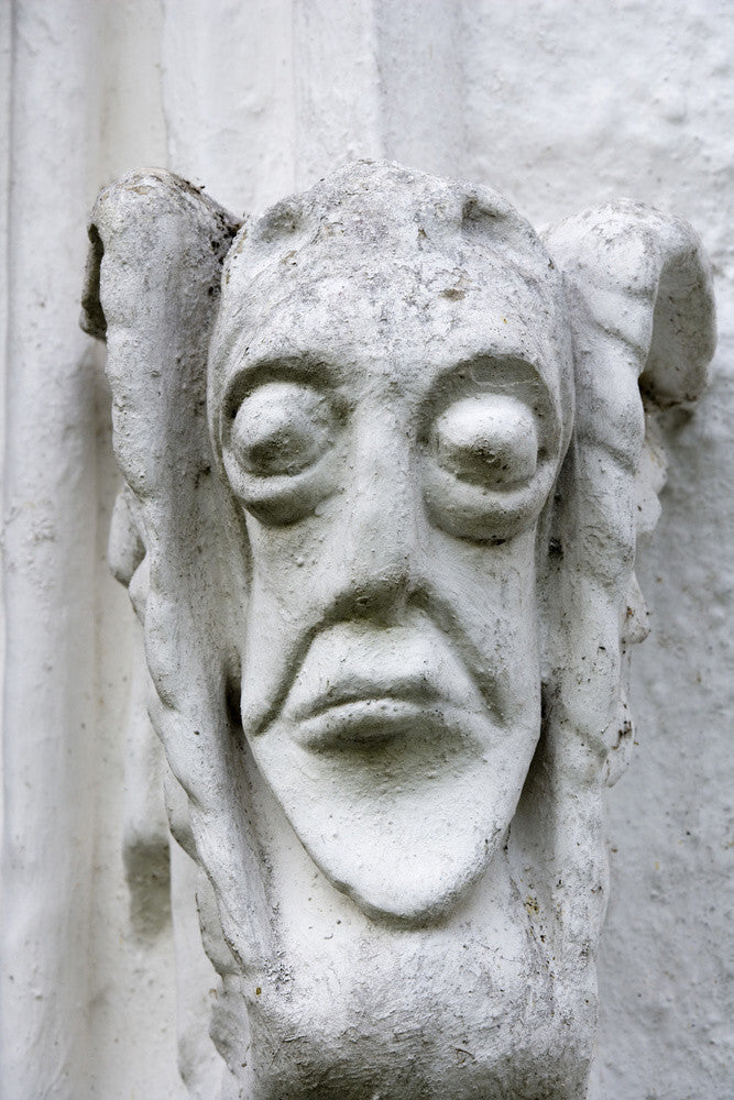 Grotesque face on the east front of Bradley Manor, a medieval manor ho ...