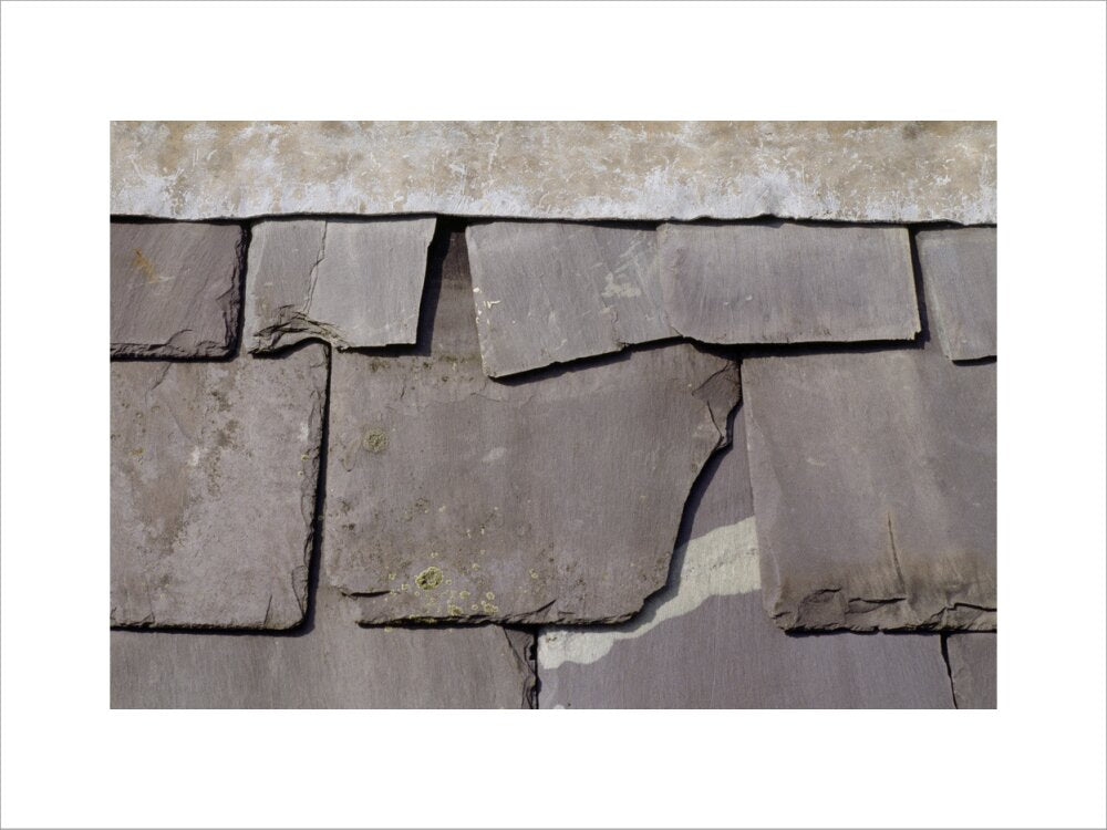 A close up of old and broken slates in need of repair at Dudmaston Hal ...