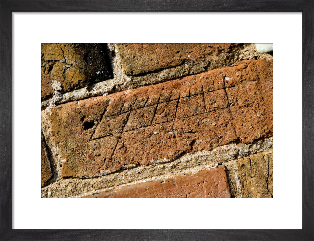 Graffitti sundial carved in the brickwork at The Workhouse, Southwell ...
