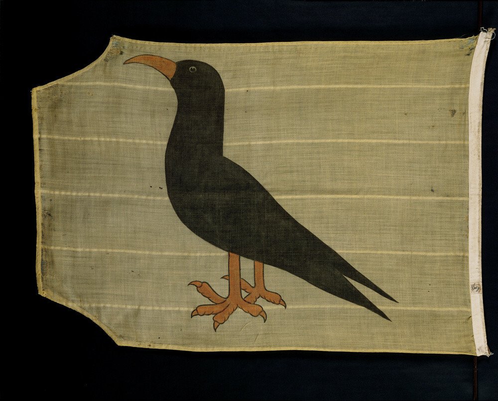 A yellow flag at Trerice, embroidered with a Cornish chough, which fle ...