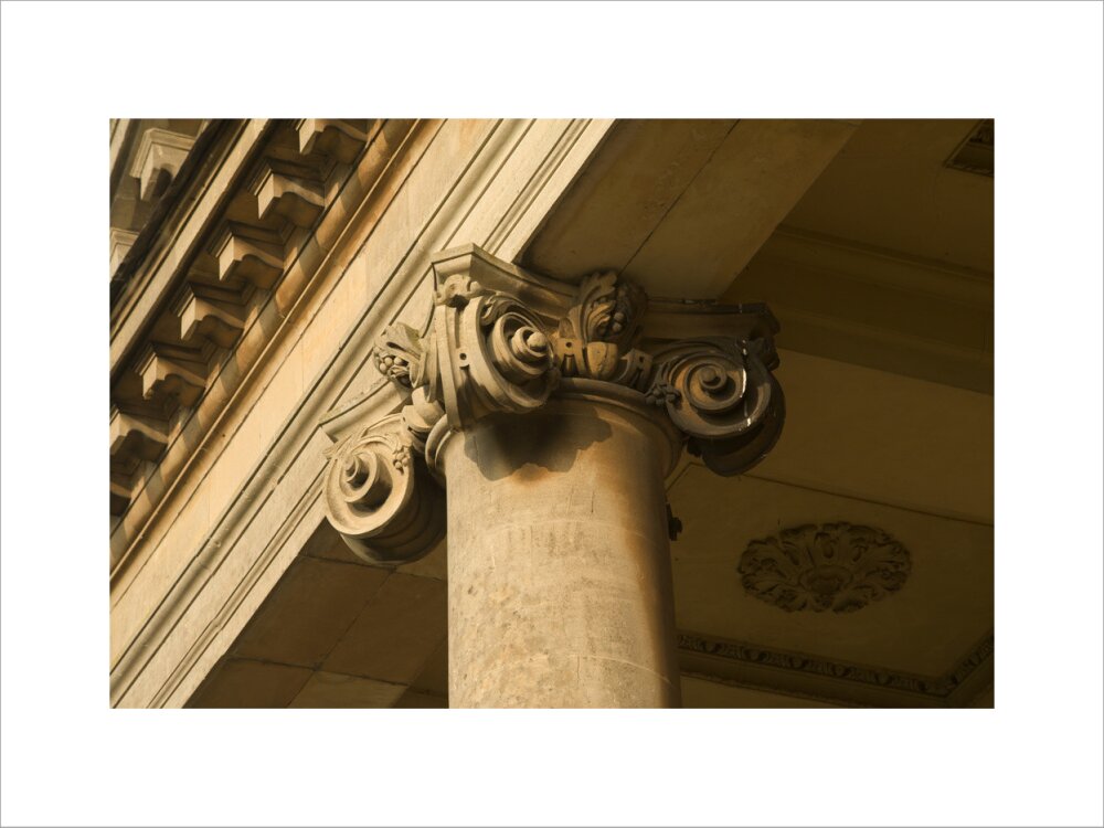 Close detail of one of the capitals on the portico on the south front ...