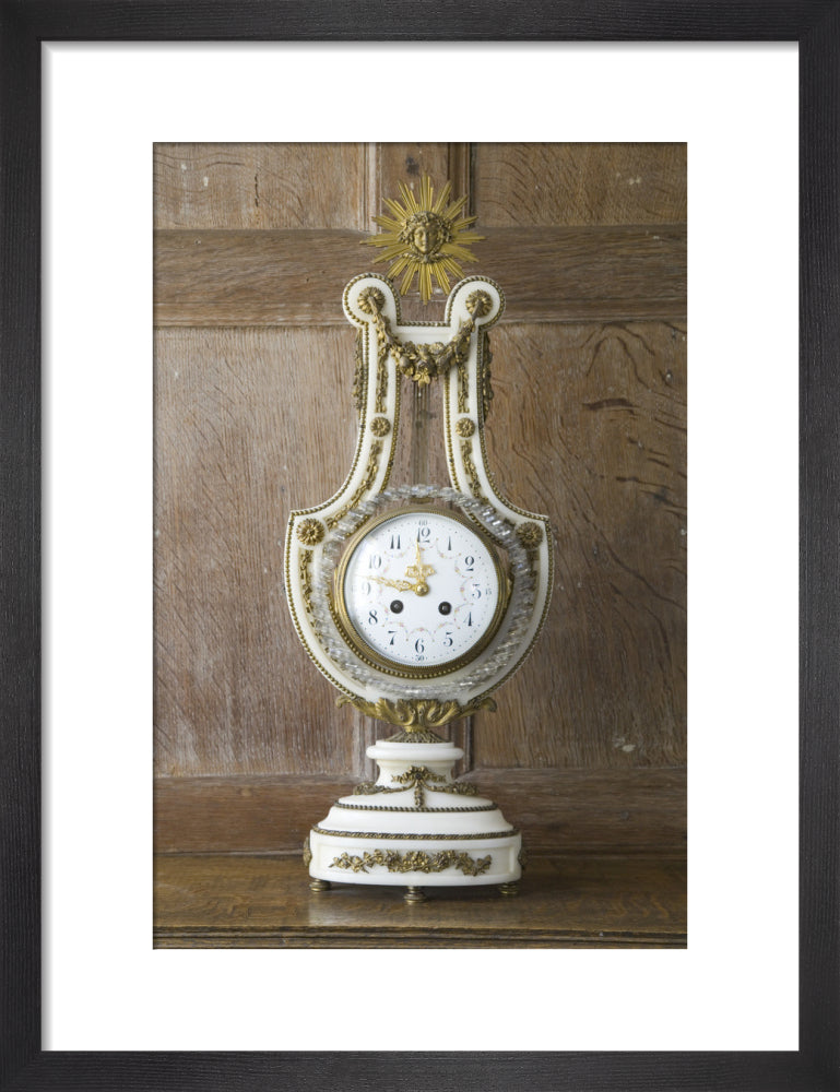 An early nineteenth-century French lyre clock with a diamante pendulum ...