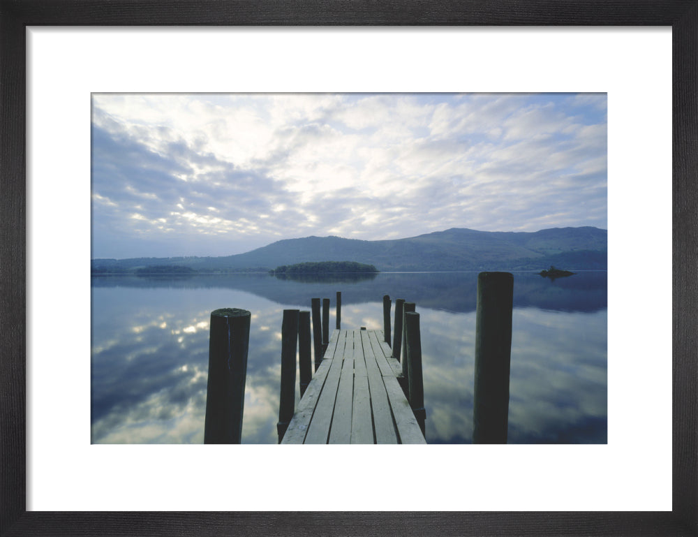 A landing stage at Hawse End with Castlerigg Fell on the far side of t ...