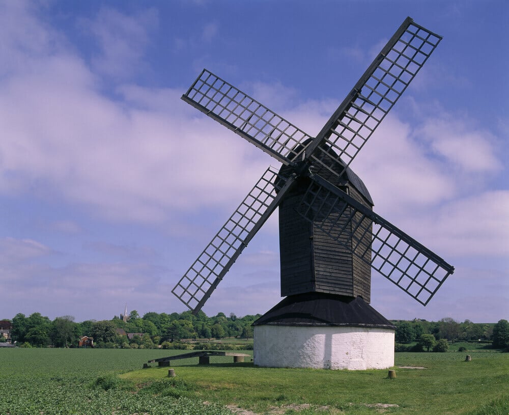 A frontal view of the Mill at Pitstone, silhouetted against the cloudy ...