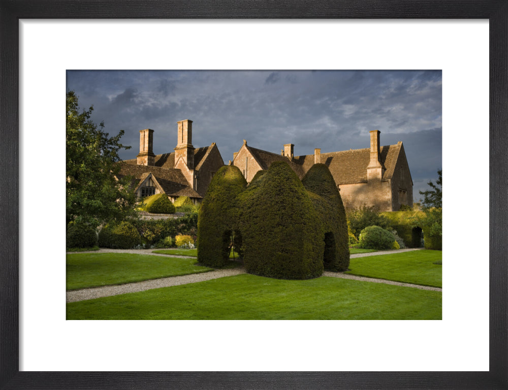 Yew topiary house on the large lawn, or pleasaunce, at the fifteenth-c ...
