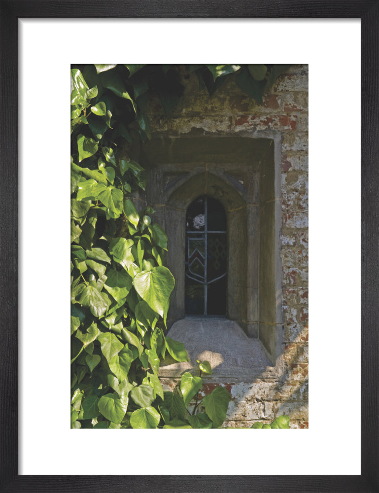 A small stone mullioned window at Baddesley Clinton, Warwickshire ...