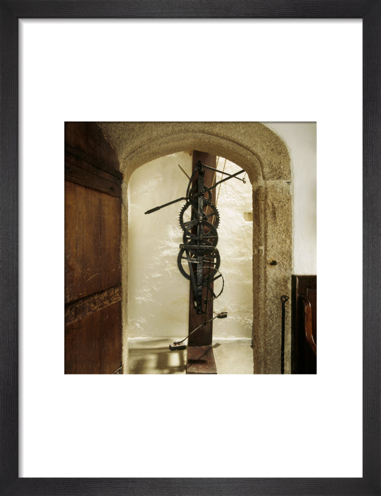 View of the pre-pendulum clock made of wrought iron and mounted on a s ...