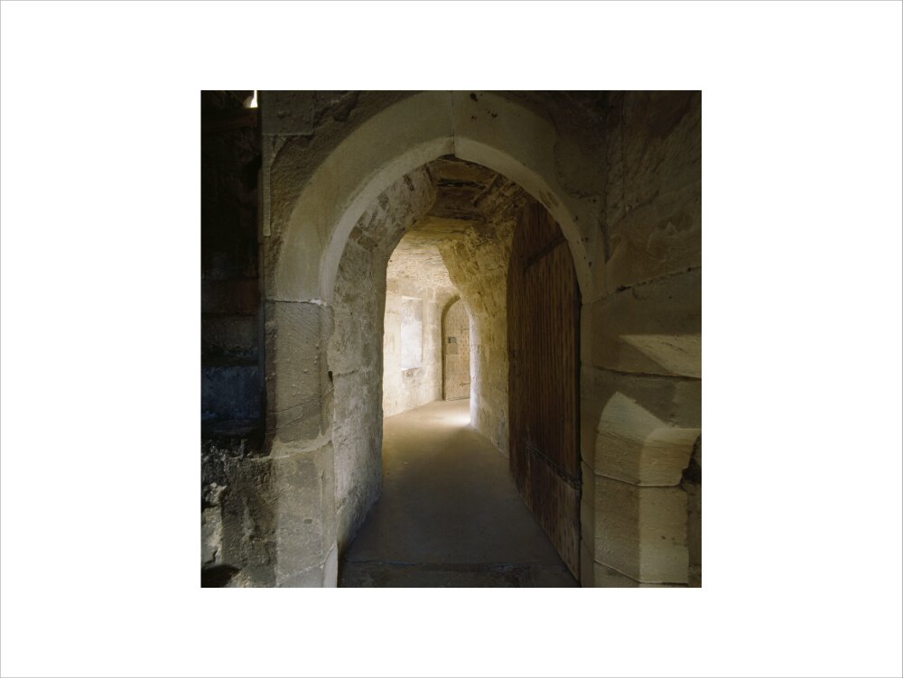 View through the arched doorway along the corridor in Adam's Tower at ...