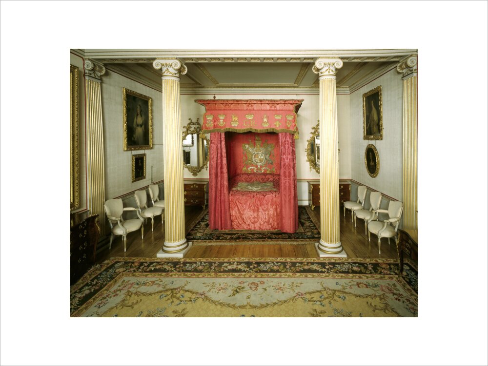 The State Bedroom at Blickling showing bed with red hangings and carpe ...